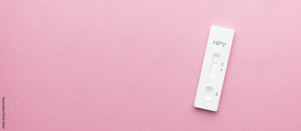 HPV test kit for cervical cancer screening on pink background ...
