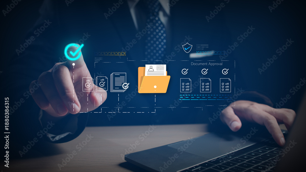 Hands typing on laptop with virtual document approval interface ...