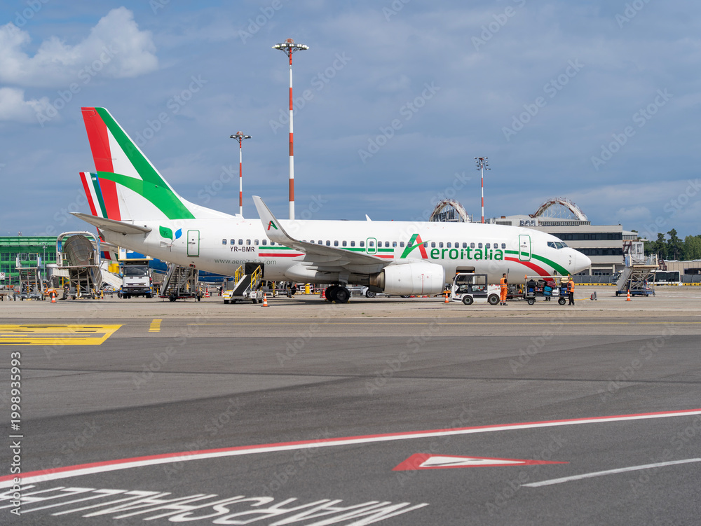 Aeroitalia Boeing 737-800 at the gate of the terminal of LIN Milano ...