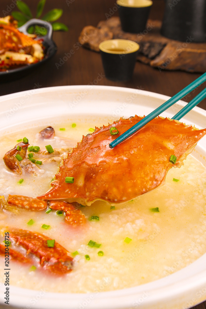 Fresh Sea Crab Congee Porridge with Chopsticks - Traditional Asian ...