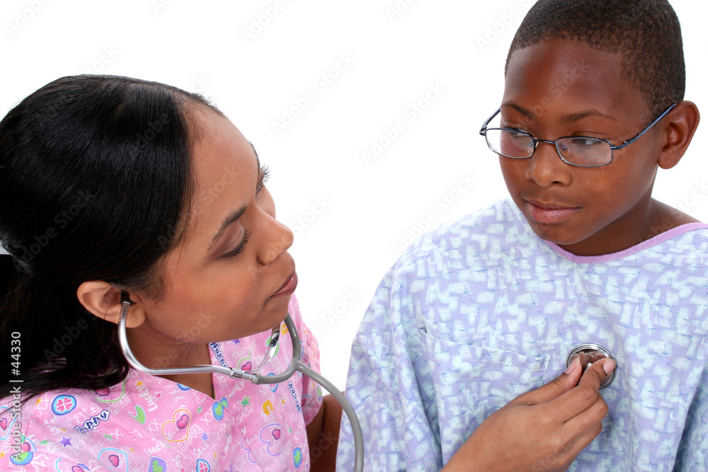 nurse checking listening to boy's chest Stock Photo | Adobe Stock