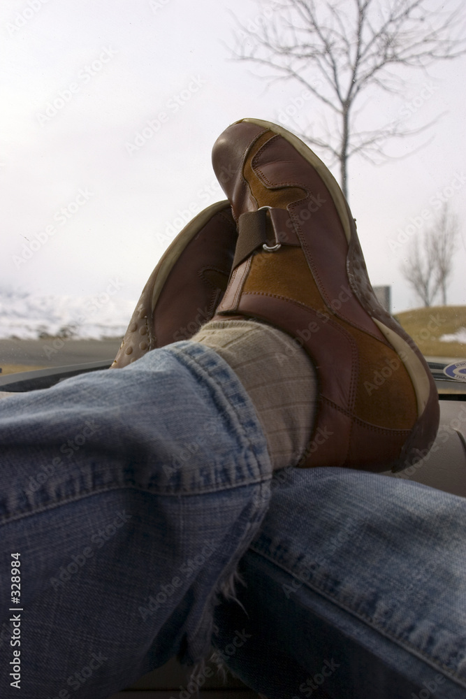 feet crossed over on the dashboard relaxing Stock Photo | Adobe Stock