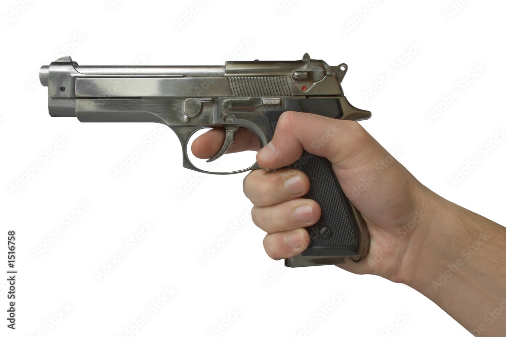 pistol in hand Stock Photo | Adobe Stock