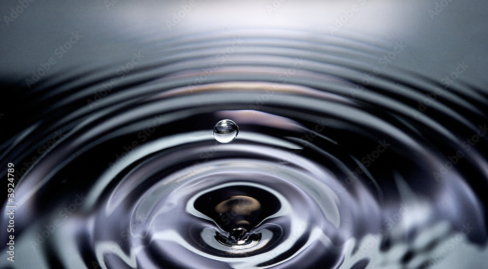 single water drop about to splash Stock Photo | Adobe Stock