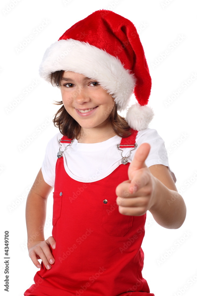 Girl with Santa's hat Stock Photo | Adobe Stock