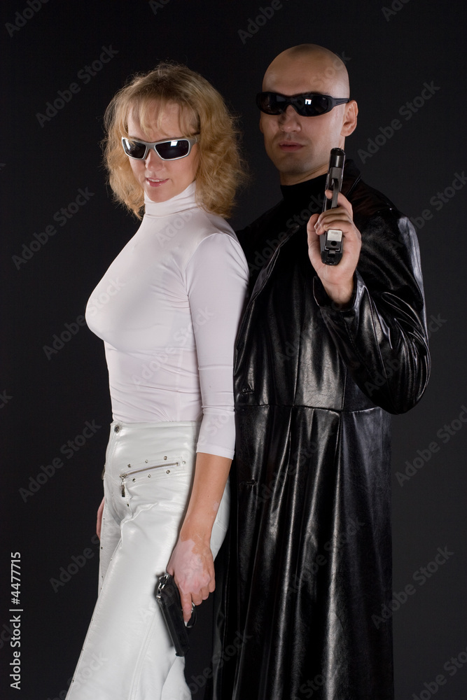 Man and women with guns Stock 写真 | Adobe Stock