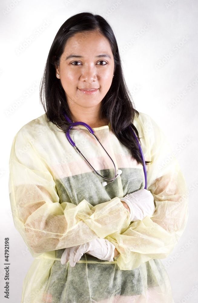 Nurse in isolation gown Stock Photo | Adobe Stock