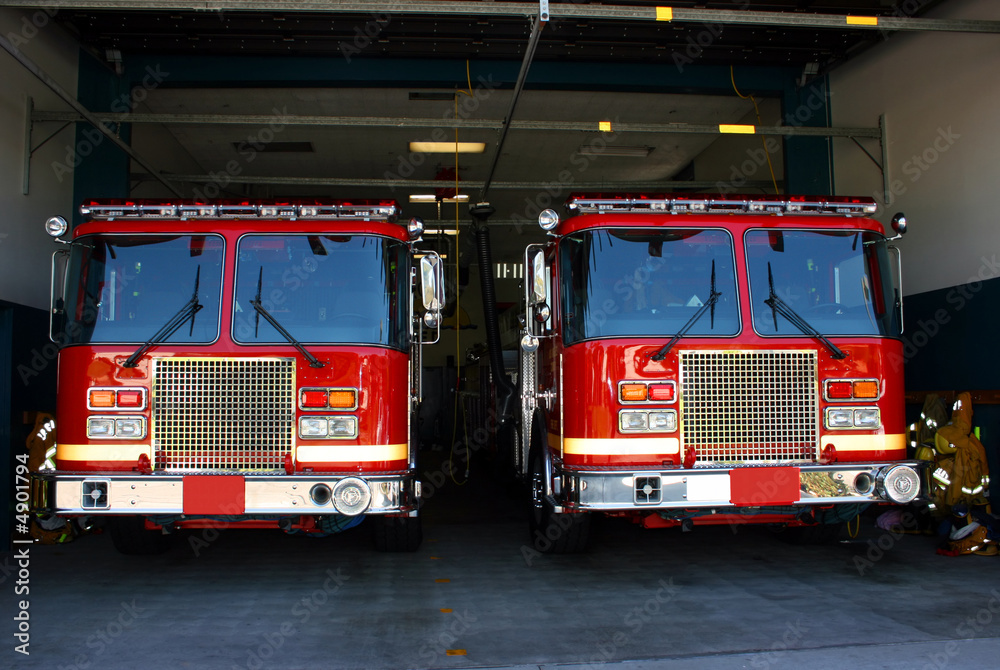 Fire station and two fire trucks Stock Photo | Adobe Stock