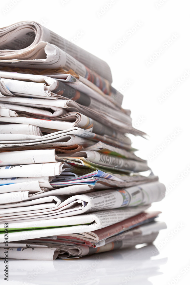 Big stack of newspaper on white background Stock Photo | Adobe Stock