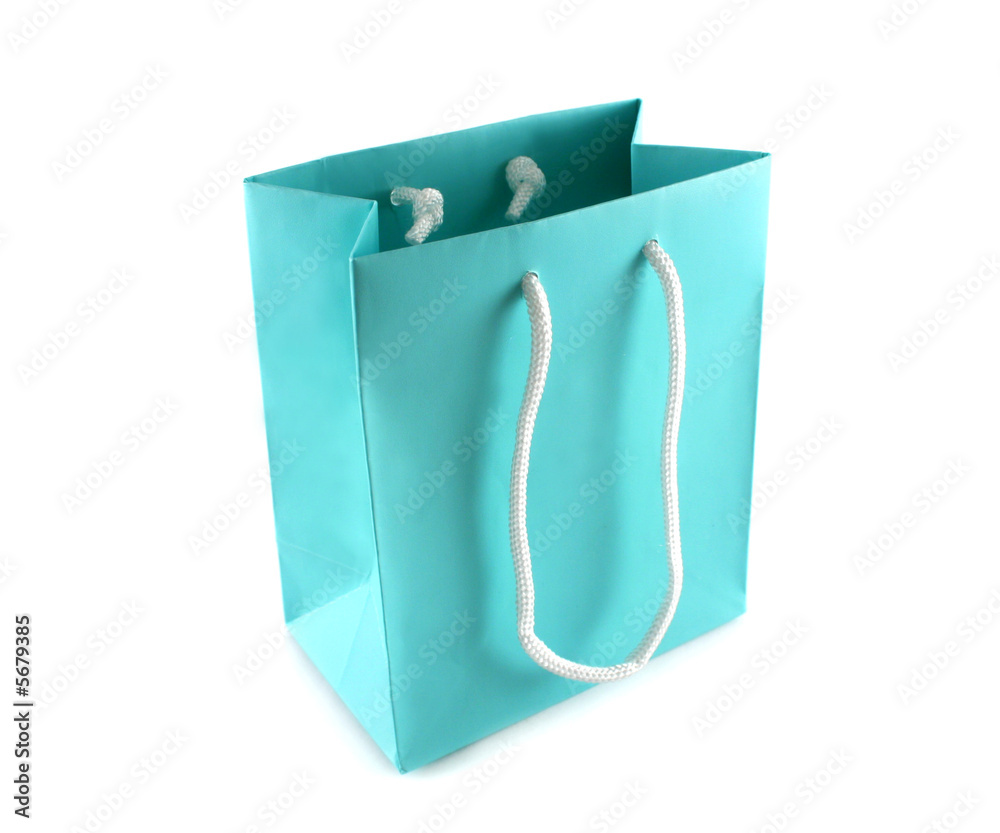 Powder blue paper gift bag with rope handles. Stock Photo | Adobe Stock