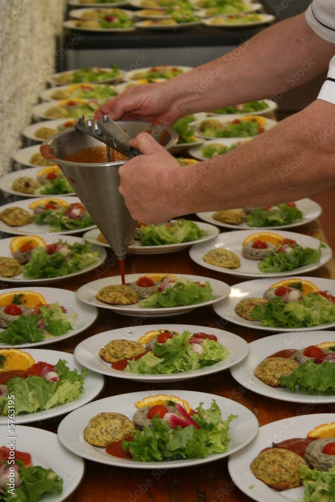 Cuisinier au travail Stock Photo | Adobe Stock