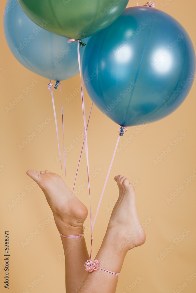balloons adhered to a leg Stock Photo | Adobe Stock