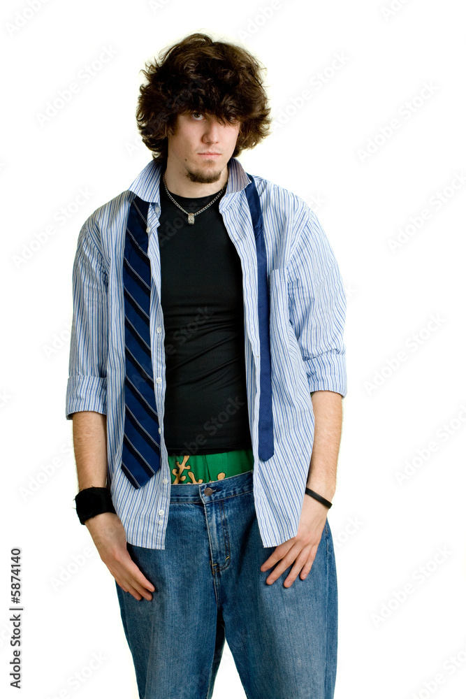 Young man in jeans and an unbuttoned dress shirt. With tie. Stock Photo ...