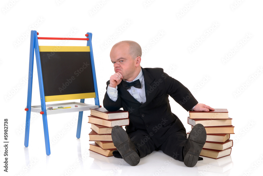 Little man, dwarf teacher in a formal suit l Stock Photo | Adobe Stock