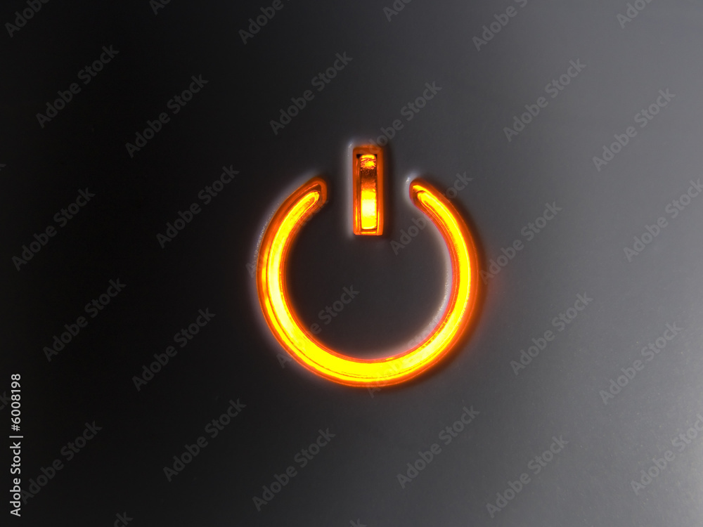 lit power button in orange color Stock Photo | Adobe Stock