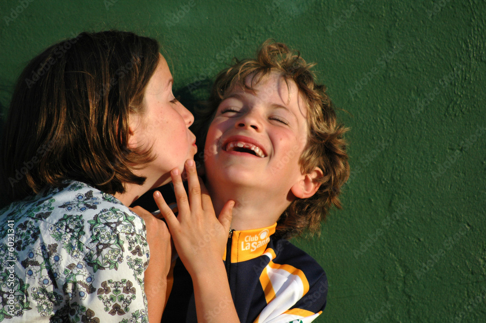 portrait of two children laughing Stock Photo | Adobe Stock
