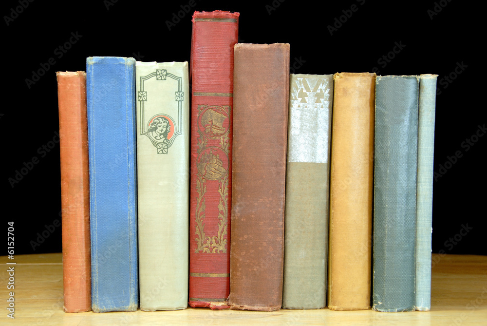 Colorful One Hundred Year Old Books Stock Photo | Adobe Stock