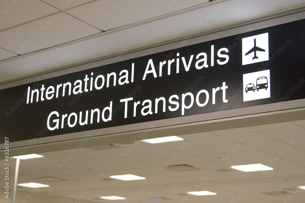 Direction signs in an airport terminal for travelers Stock Photo ...