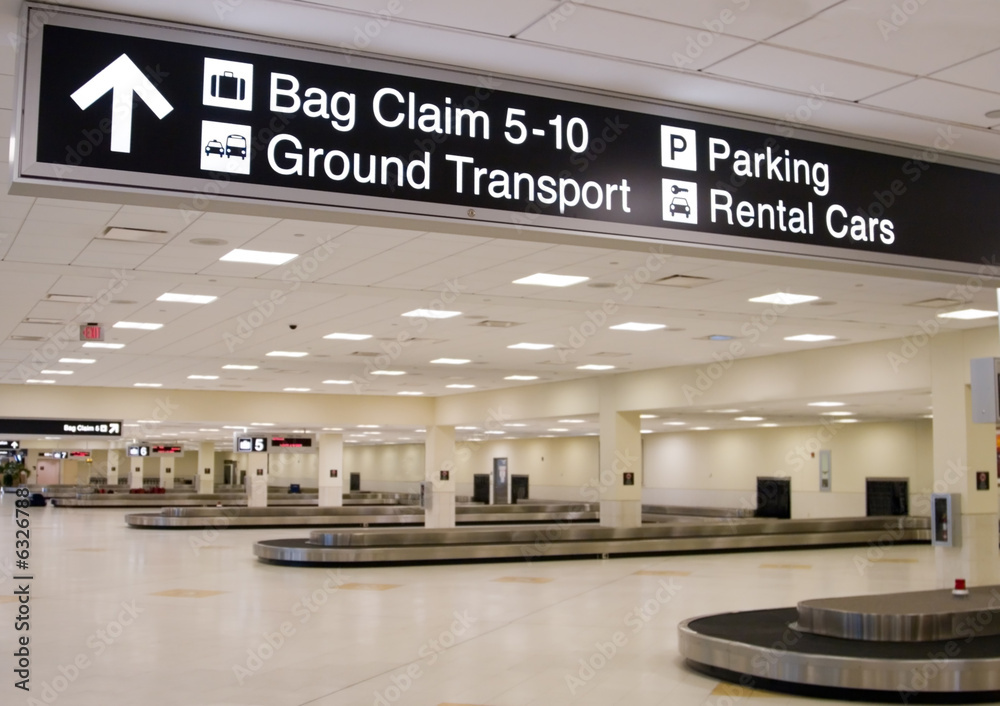 Direction signs in an airport terminal for travelers Stock Photo ...