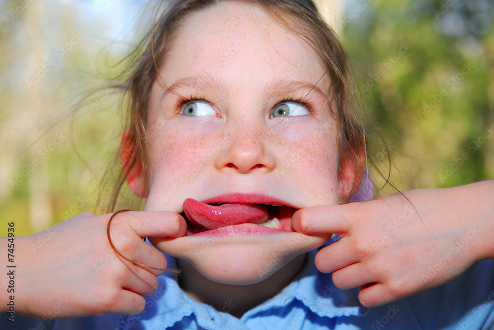 Girl Making Funny Face Stock Photo | Adobe Stock
