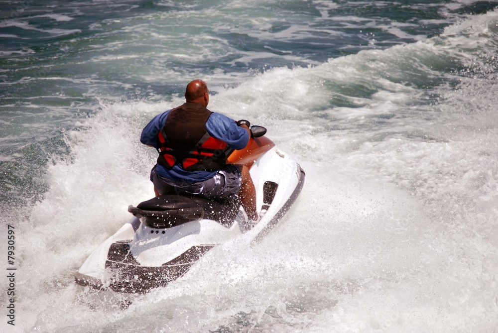 Fat Man on a Jetski Stock Photo | Adobe Stock