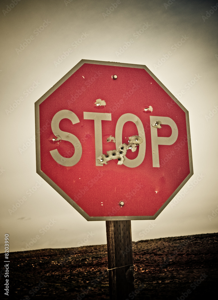 Stop sign with bullet holes Stock Photo | Adobe Stock