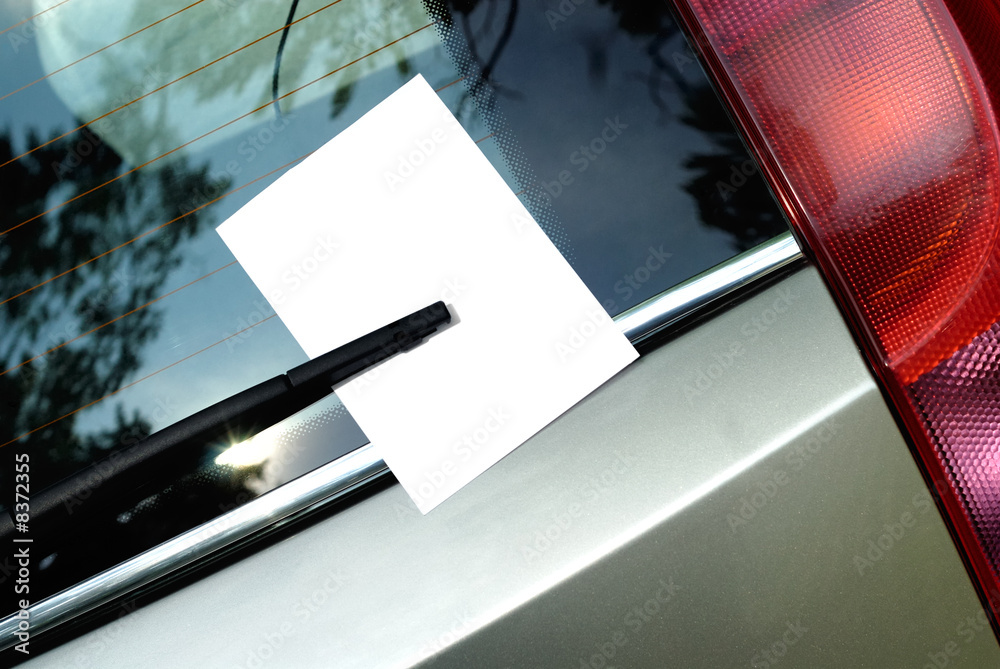 Leaflet behind car wiper Stock Photo | Adobe Stock