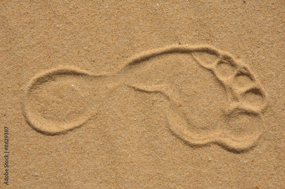 Single footprint on sand Stock Photo | Adobe Stock