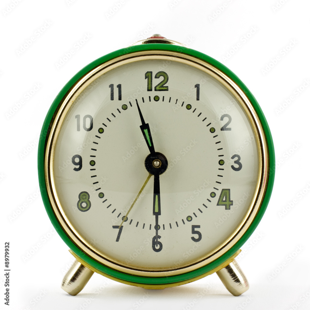Vintage mechanical wind-up alarm clock over white isolated Stock Photo ...