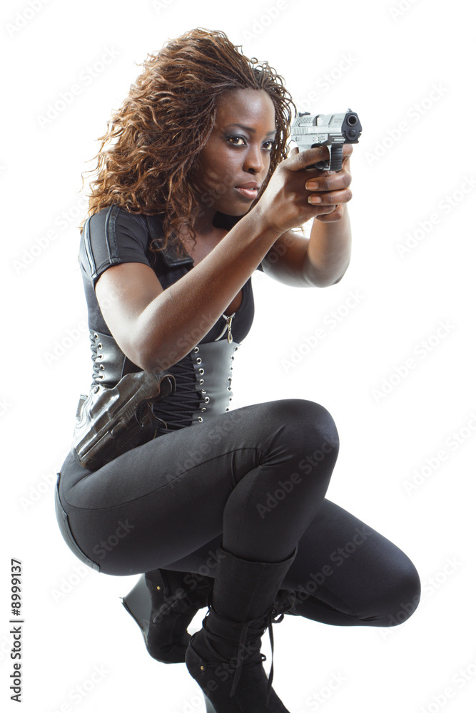 Woman body guard pointing a gun Stock Photo | Adobe Stock