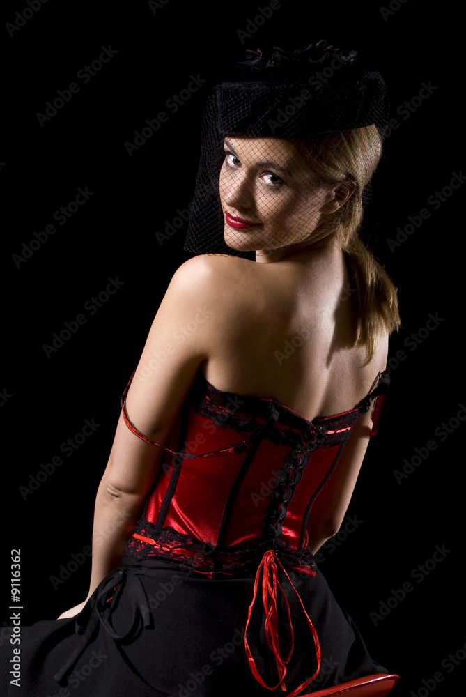 Attractive cabaret with net over her face looking back at camera Stock ...