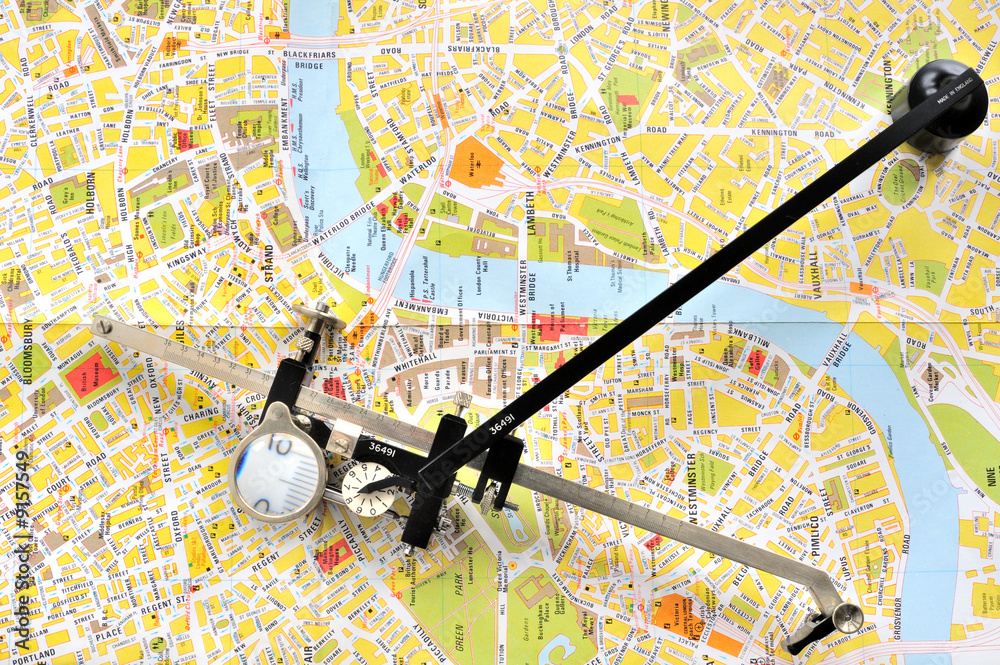 Planimeter - 1950s area measuring instrument - on old London map Stock ...