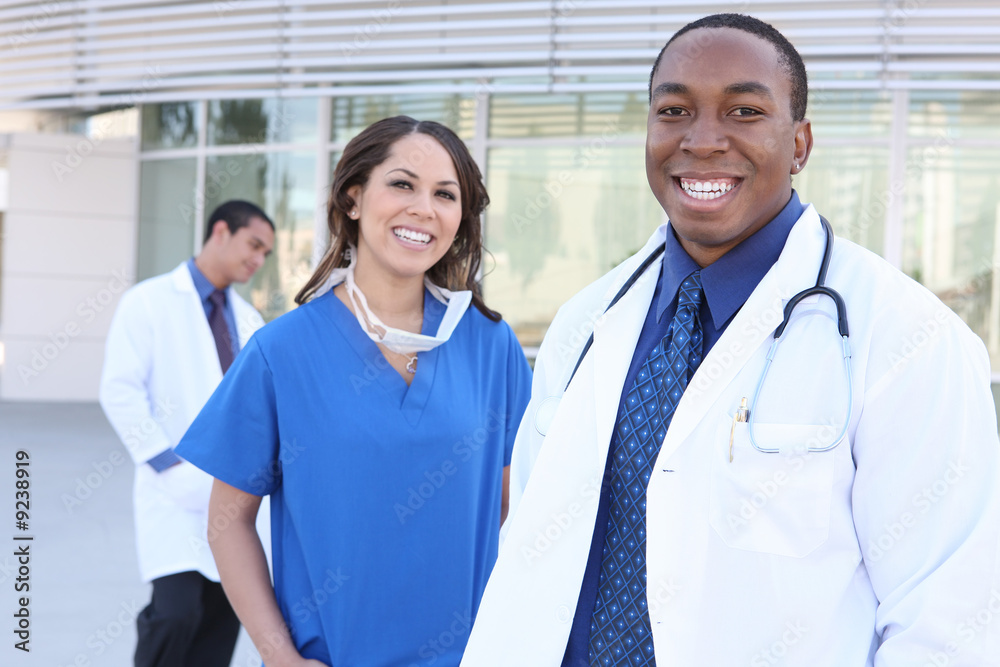A happy and successful medical team outside hospital Stock Photo ...