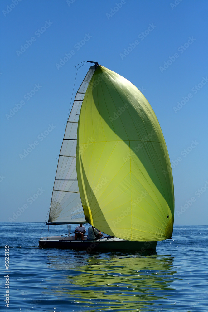 Sailing yacht with spinnaker in the wind / beautiful image Stock Photo ...