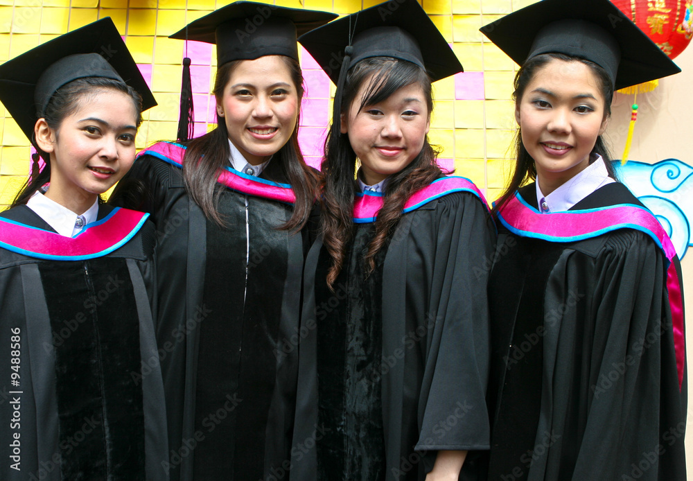 Beautiful Asian university graduates celebrate their success. Stock ...