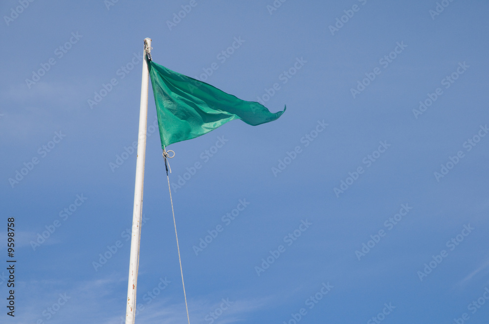 Green flag sigh for safety Stock Photo | Adobe Stock