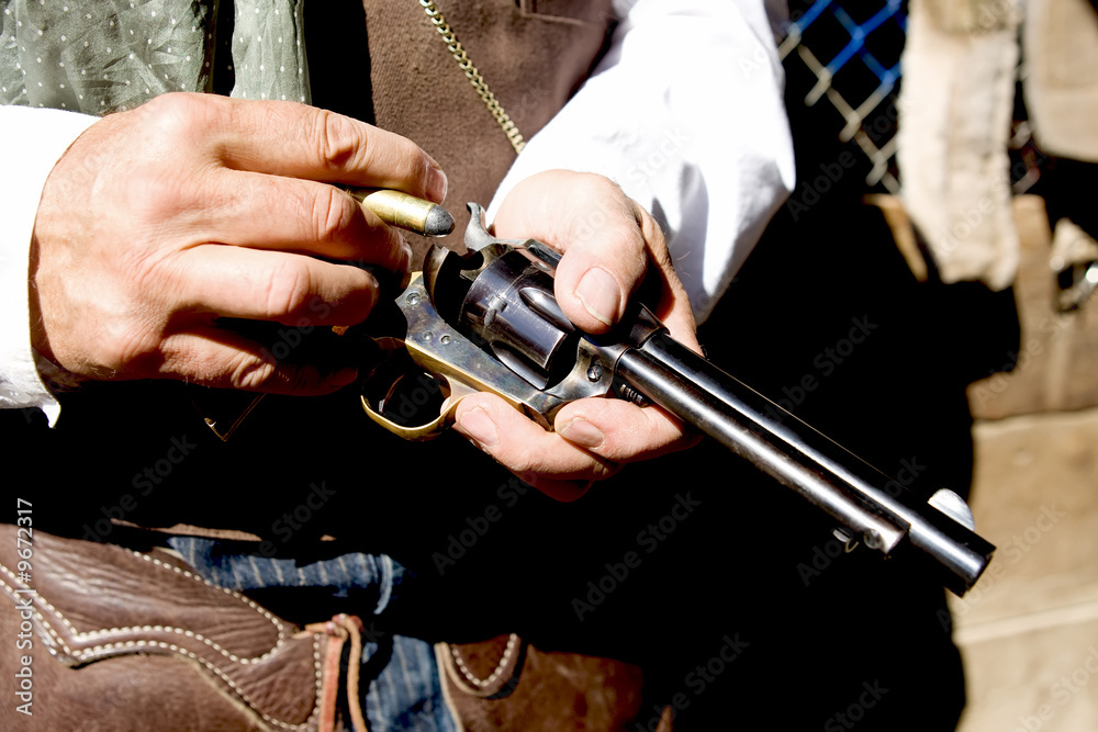 Upclose horizontial photo loading bullets into a handgun Stock Photo ...