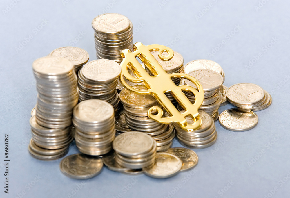 small silver coins with golden dollar sign Stock Photo | Adobe Stock