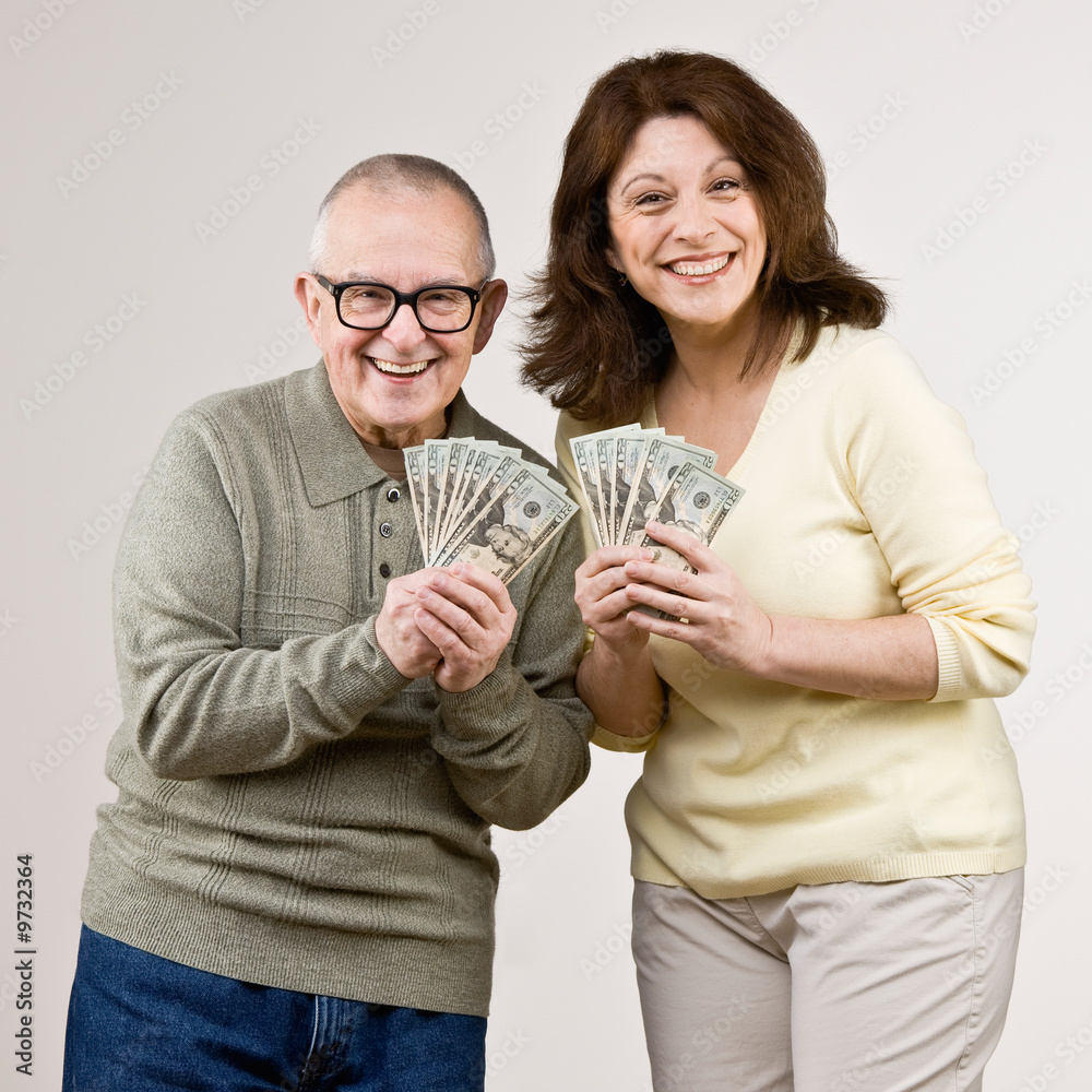 Wealthy friends excitedly holding group of twenty dollar bills Stock ...