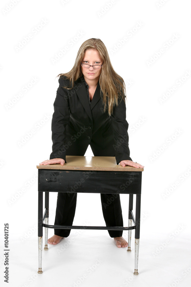 business woman in black suit leaning over school desk Stock Photo ...