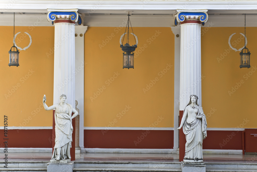 Ancient Greek statues standing outside a classic temple Stock Photo ...