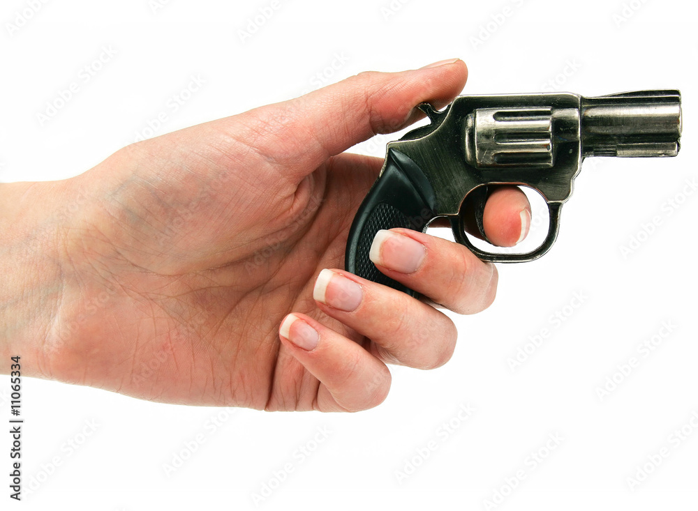 Small revolver gun in female hand Stock Photo | Adobe Stock