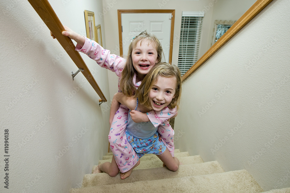 young kids playing on stairs Stock Photo | Adobe Stock