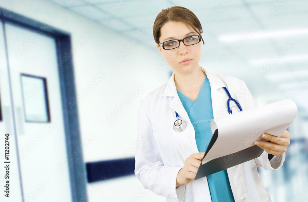doctor holding patient's chart/medical documents Stock Photo | Adobe Stock