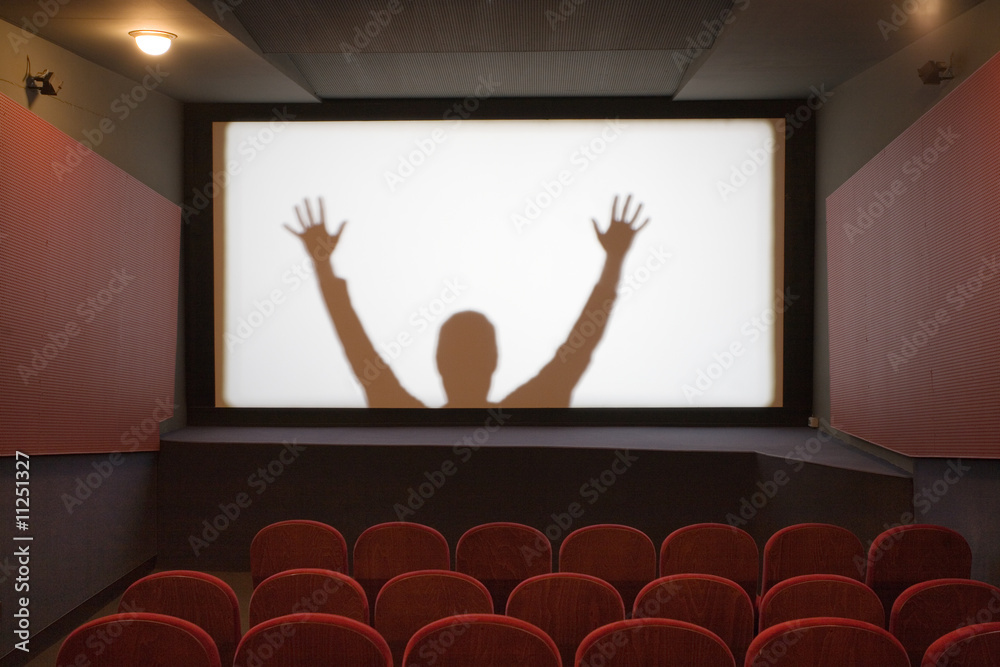 cinema screen with human silhouette Stock Photo | Adobe Stock