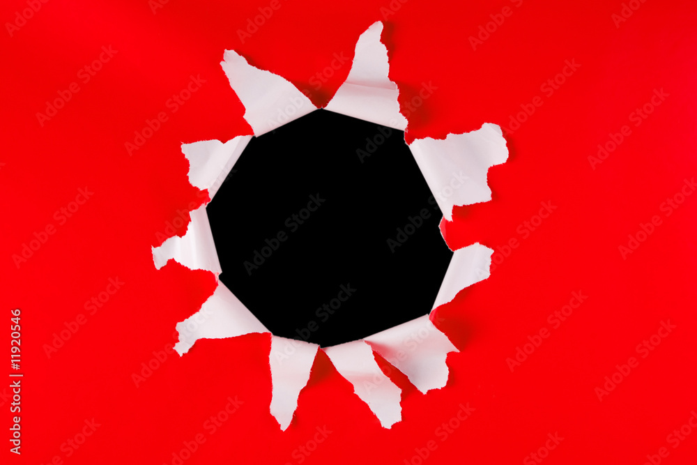 Hole in red paper background Stock Photo | Adobe Stock