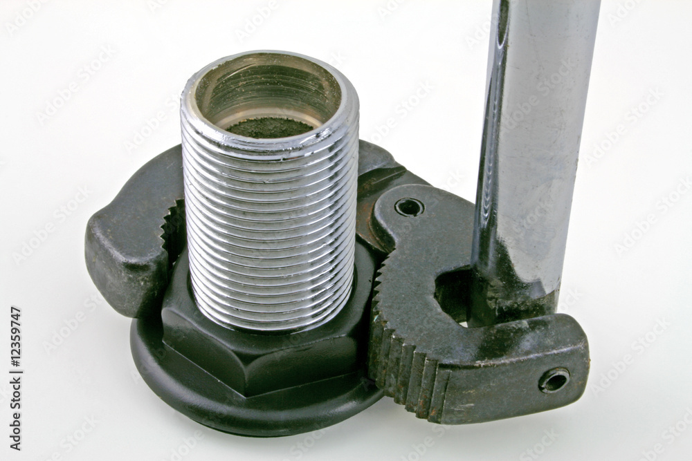 securing tail of pillar tap with basin wrench Stock Photo | Adobe Stock