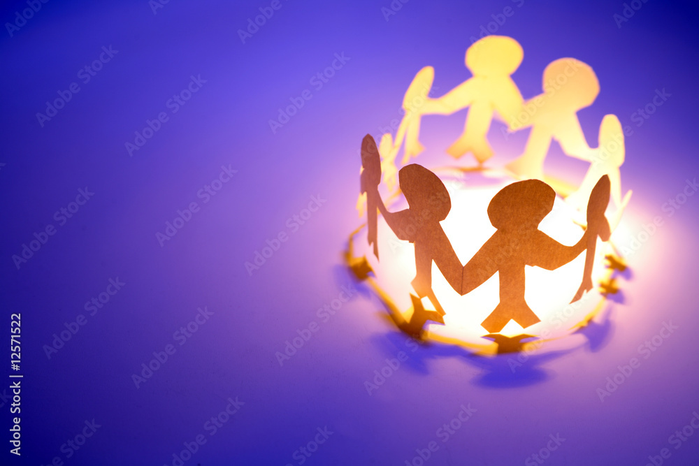 Paper-chain people holding hands in a circle Stock Photo | Adobe Stock