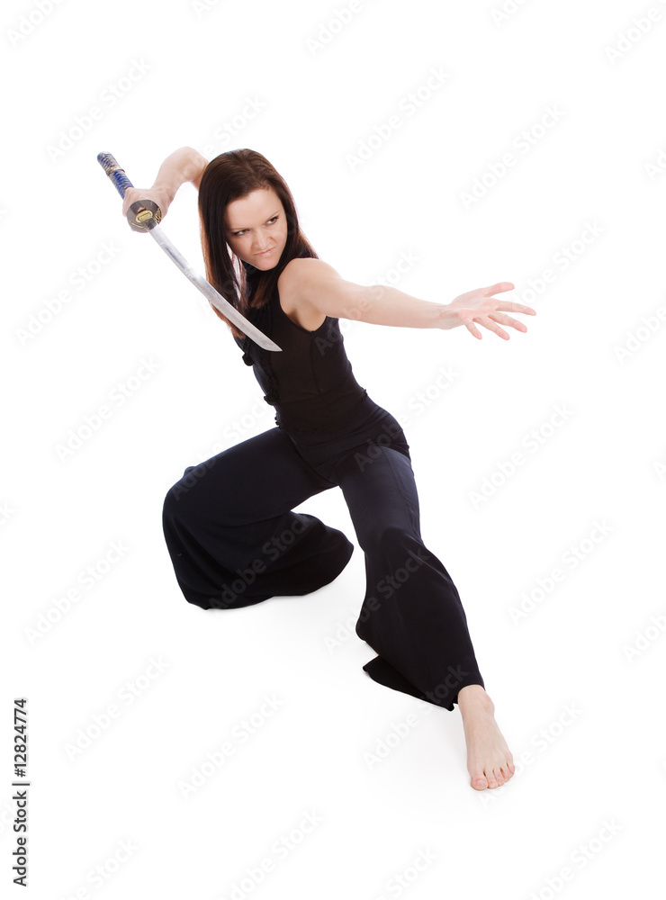 Beautiful woman in an aggressive posture with a sword Stock Photo ...