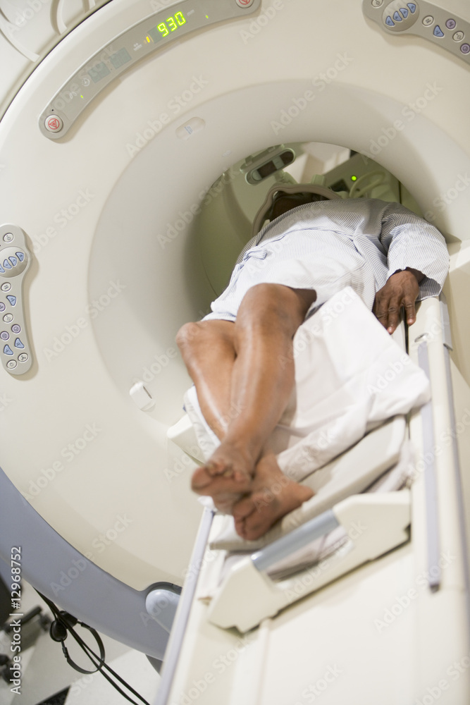 Patient Undergoing A Computerized Axial Tomography (CAT) Scan Stock ...